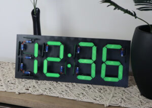 Ectromechanical Arduino clock built using 28 servos - Geeky Gadgets